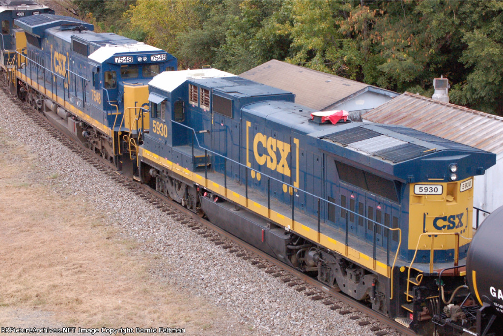 CSX B40-8 #5930 and C40-8 #7548 trail in a northbound consist. 5930, its stack capped, has had ...